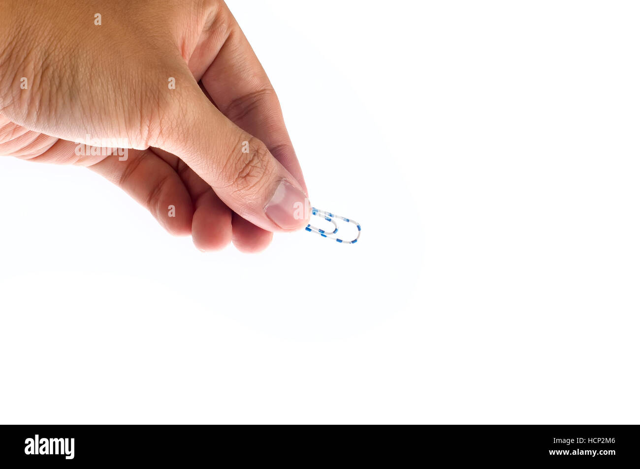 Colorful paper clip in man's hand isolated on white background Stock ...