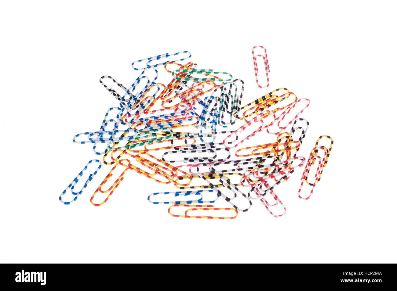 Paperclips on a white isolated background Stock Photo - Alamy
