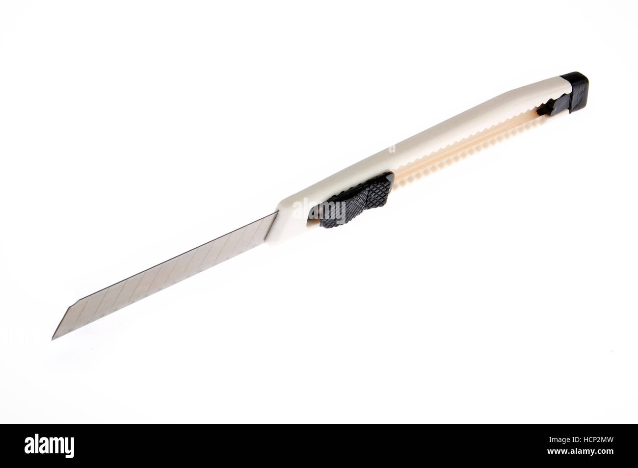 Office paper cutter on white background Stock Photo - Alamy