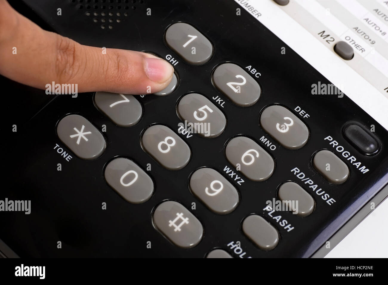 Human finger pushed the black phone button Stock Photo - Alamy