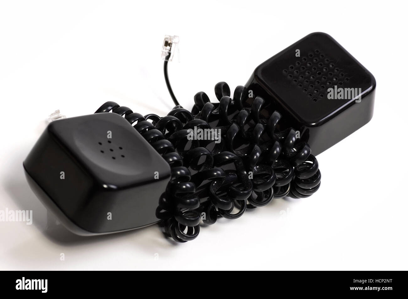 Black phone tube got tied by telephone cord Stock Photo - Alamy