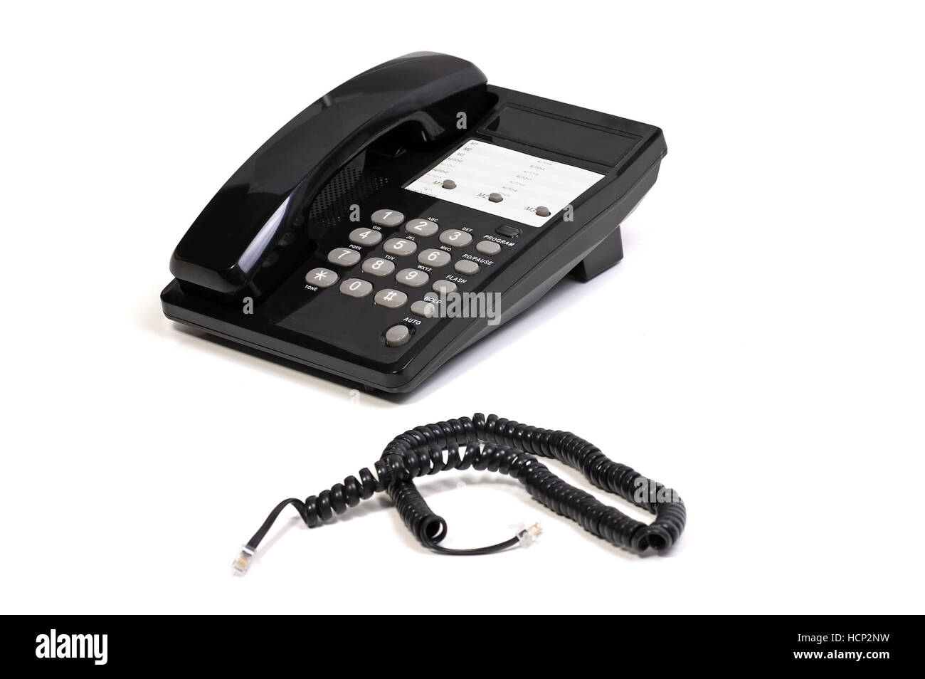 Black Office Telephone and Phone Cord on White Background Stock Photo ...