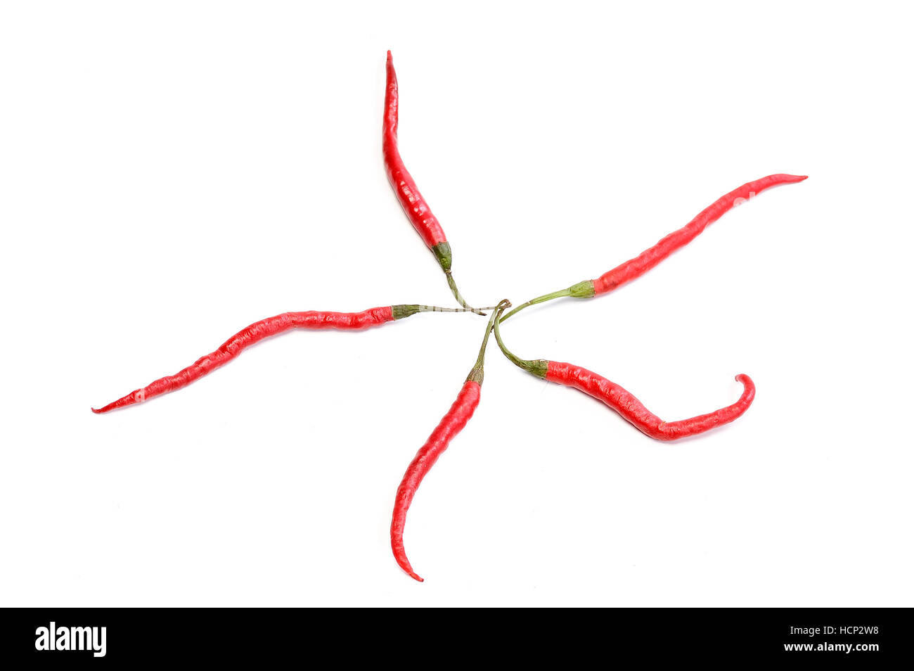 Five Red Hot Chili Pepper on White Background Stock Photo - Alamy
