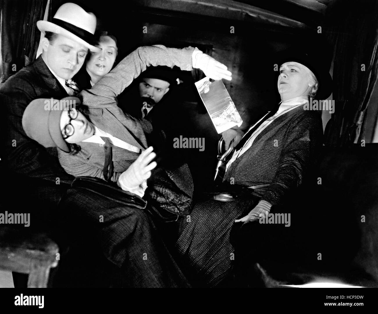 DRACULA, man wearing hat, left: Dwight Frye; girl with glasses, falling ...