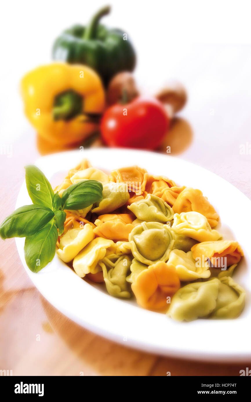 Coloured Tortellini filled with meat Stock Photo - Alamy