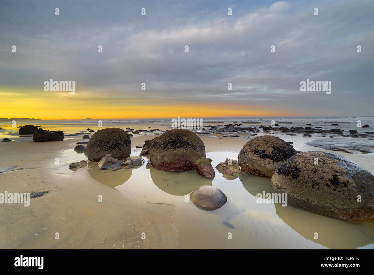 Big rock at moeraki boulders beach, New Zealand Stock Photo - Alamy