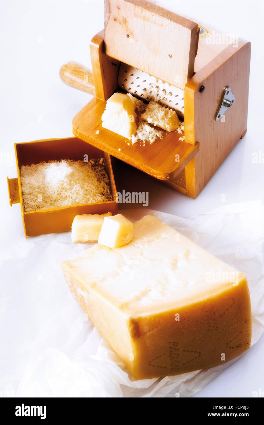Cheese mill and Parmesan Stock Photo - Alamy