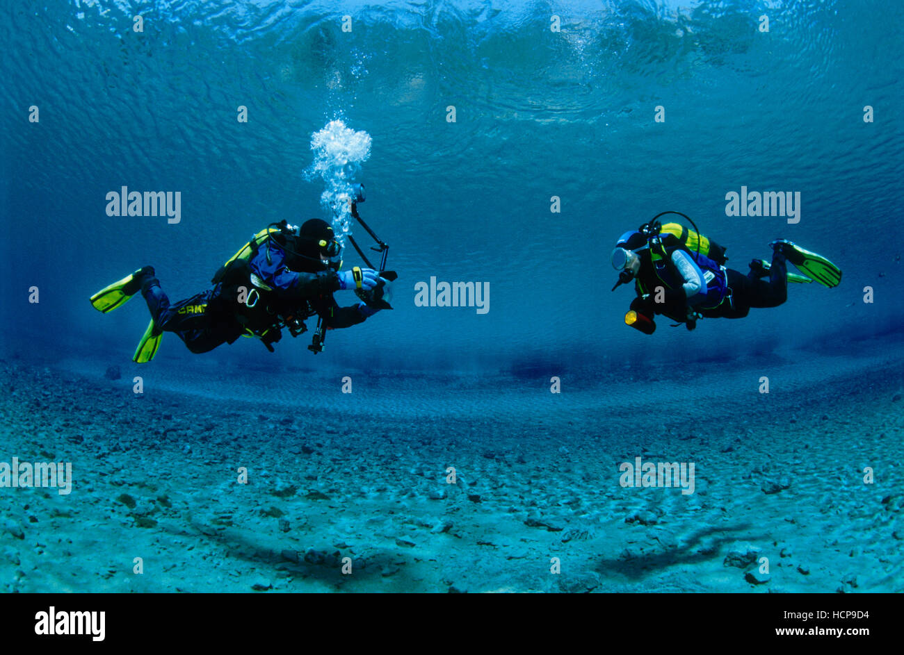 Two divers, an underwater photographer and his model, Tragoess, Styria ...
