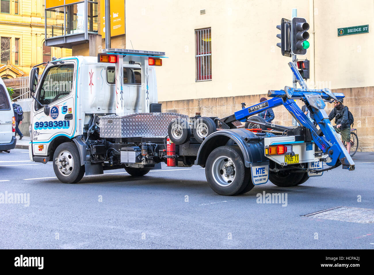 SYDNEY, AUSTRALIA - AUGUST 26, 2016: Towing car on the road as a road ...