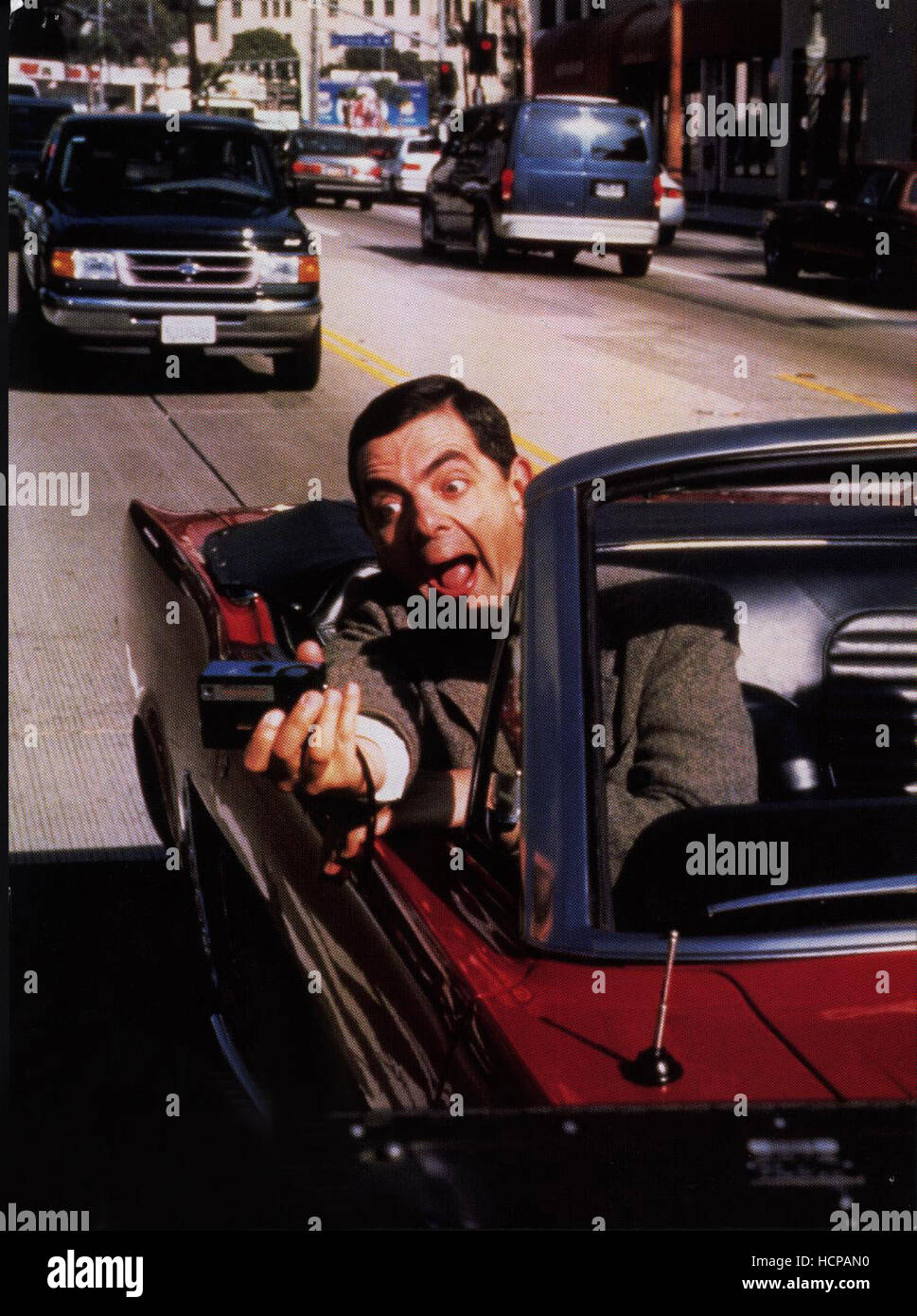 BEAN, Rowan Atkinson, 1997, taking his own picture Stock Photo - Alamy