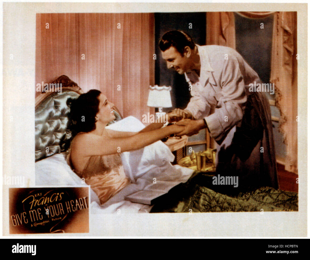 GIVE ME YOUR HEART, from left: Kay Francis, George Brent, 1936 Stock Photo - Alamy