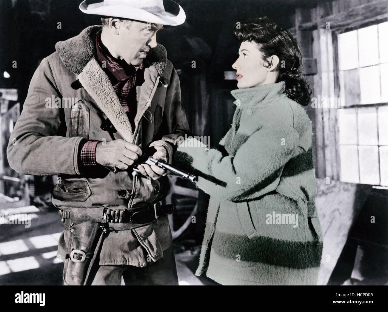 NIGHT PASSAGE, from left: James Stewart, Dianne Foster, 1957 Stock ...