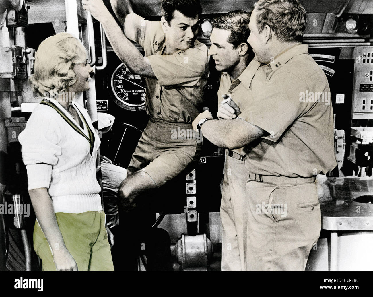 OPERATION PETTICOAT, Dina Merrill (left), Tony Curtis (on ladder), Cary Grant (second from left ...