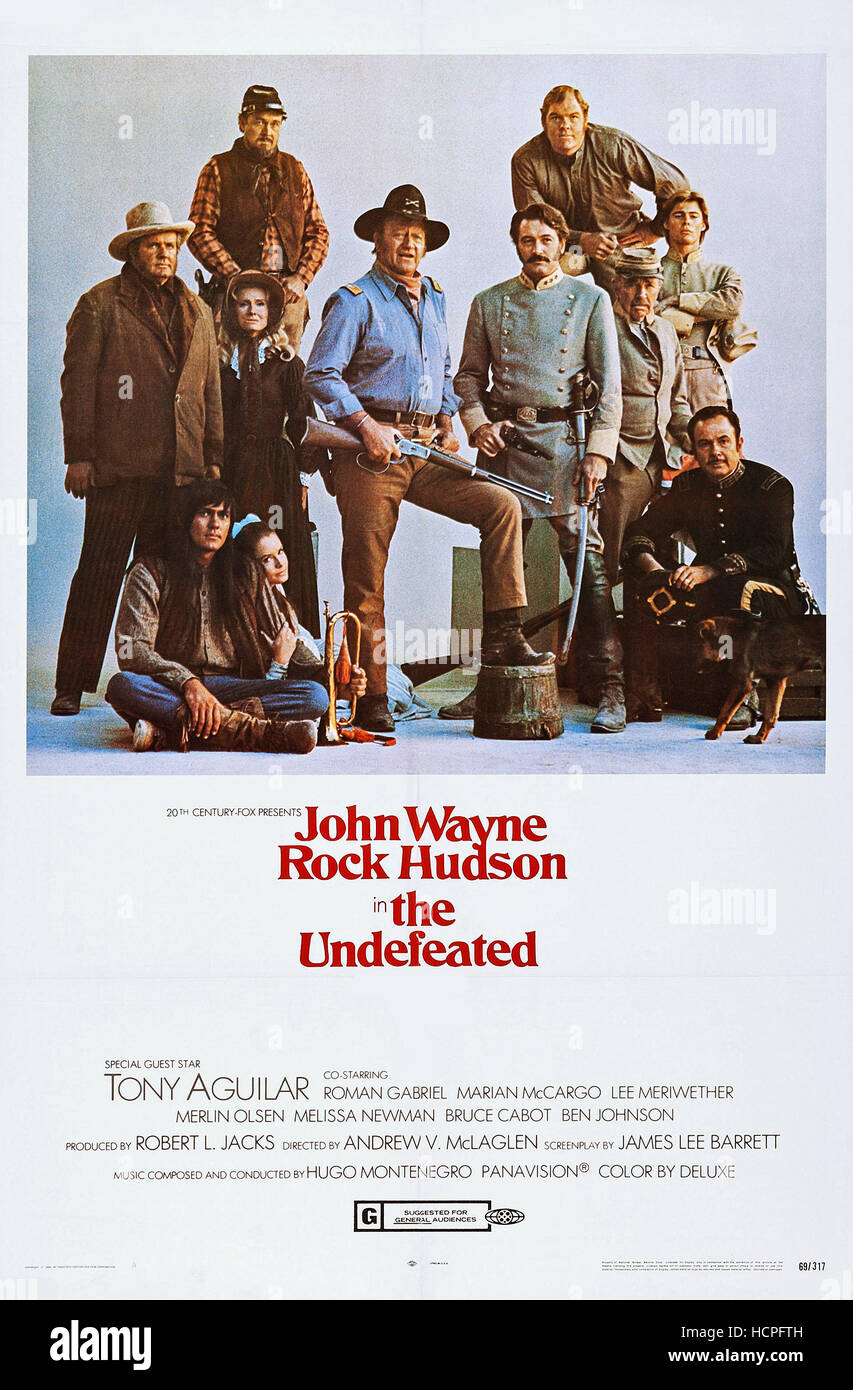 THE UNDEFEATED, front second from left: Marian McCargo, center: John ...