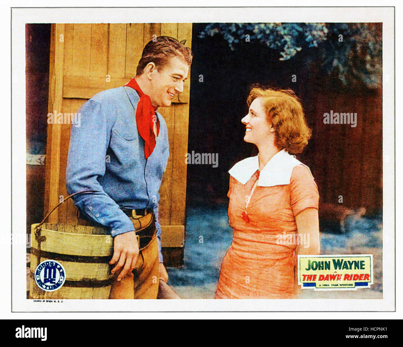 THE DAWN RIDER, l-r: John Wayne, Marion Burns on lobbycard, 1935 Stock ...
