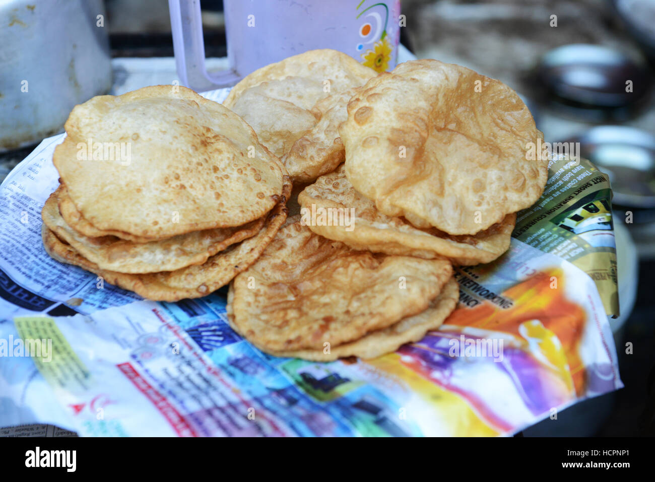 Puri ( fried dough bread ) is a popular breakfast in northern India ...