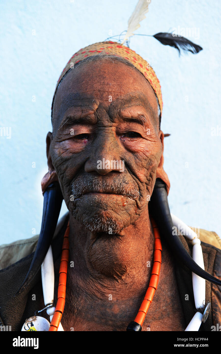 Portrait of a tattooed head hunter warrior from the Konyak tribe in ...