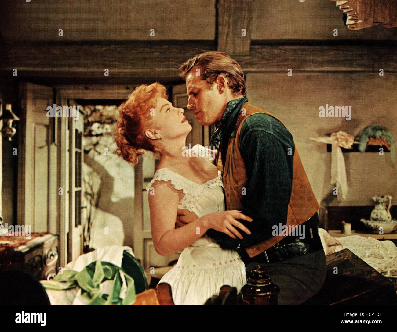 THREE VIOLENT PEOPLE, Anne Baxter, Charlton Heston, 1956 Stock Photo ...