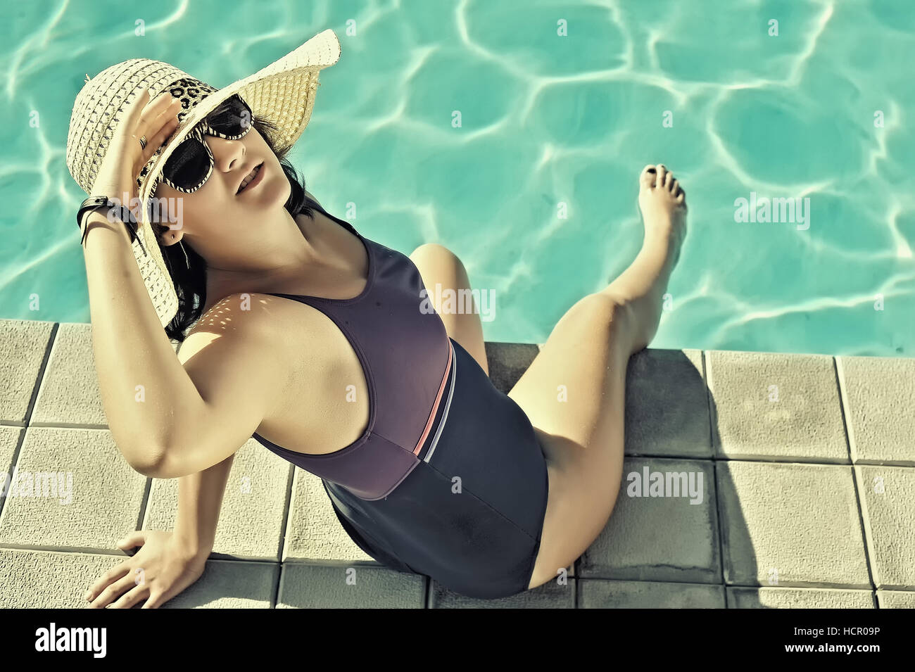 Girl in swimming pool Stock Photo - Alamy