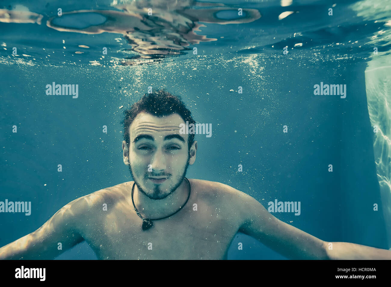 Person underwater swimming up hi-res stock photography and images - Alamy