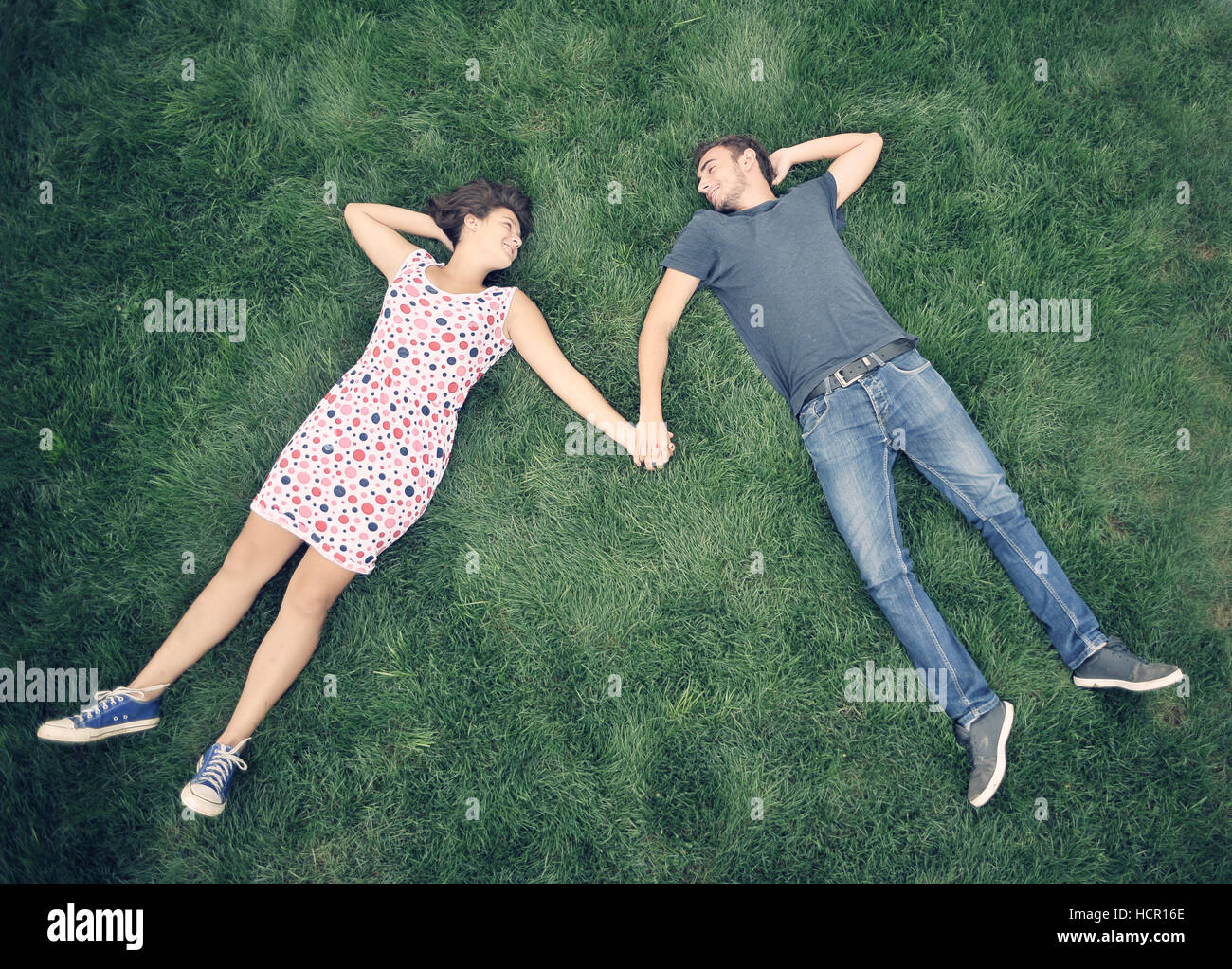 Young Couple Lying Field High Resolution Stock Photography and Images ...