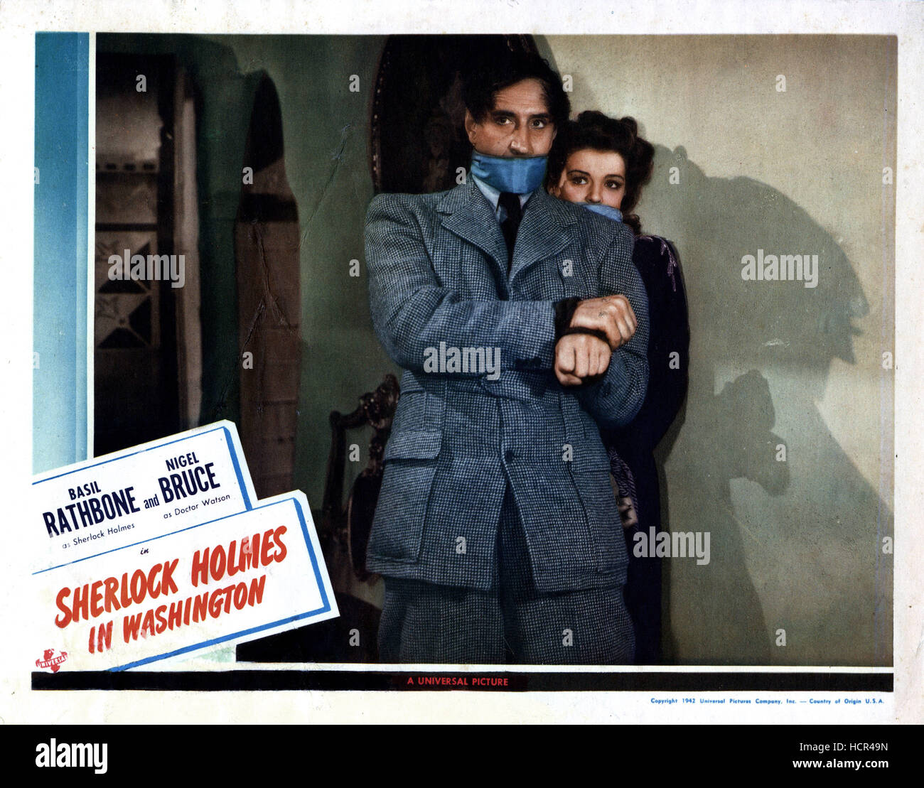 SHERLOCK HOLMES IN WASHINGTON, from left, Basil Rathbone, Marjorie Lord ...