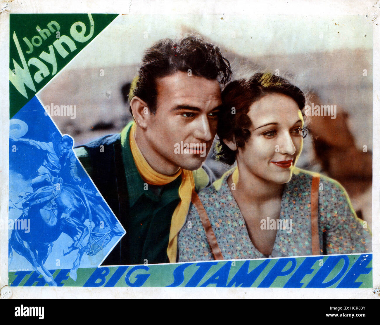 THE BIG STAMPEDE, from left, John Wayne, Mae Madison, 1932 Stock Photo ...