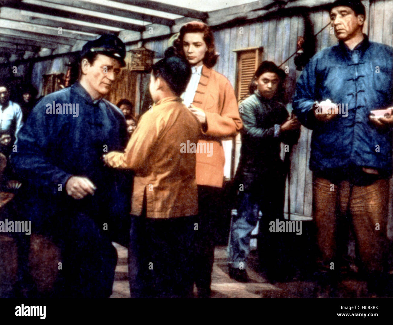 BLOOD ALLEY, John Wayne, Lauren Bacall, Mike Mazurki, 1955 Stock Photo ...