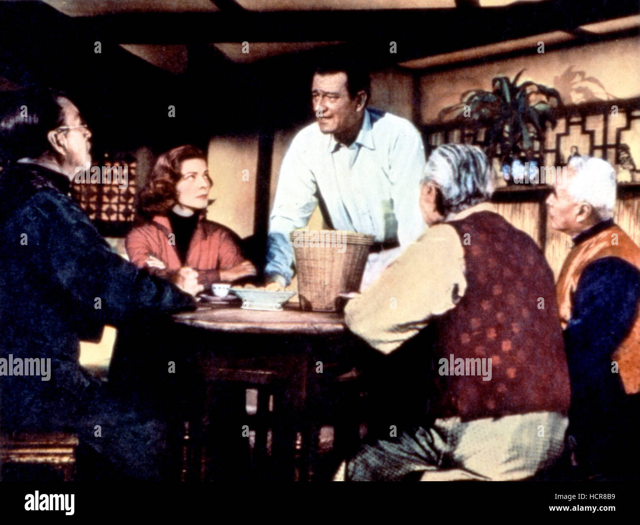 BLOOD ALLEY, Paul Fix, Lauren Bacall, John Wayne, 1955 Stock Photo - Alamy