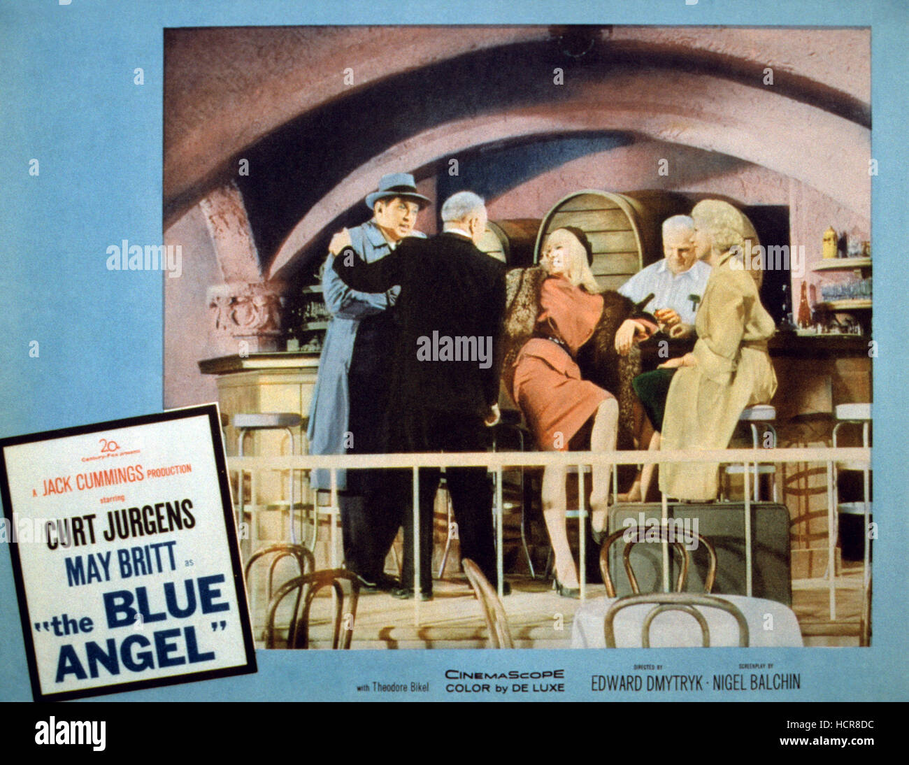 THE BLUE ANGEL, from left: Theodore Bikel, Curd Jurgens (back to camera), May Britt, 1959, TM ...
