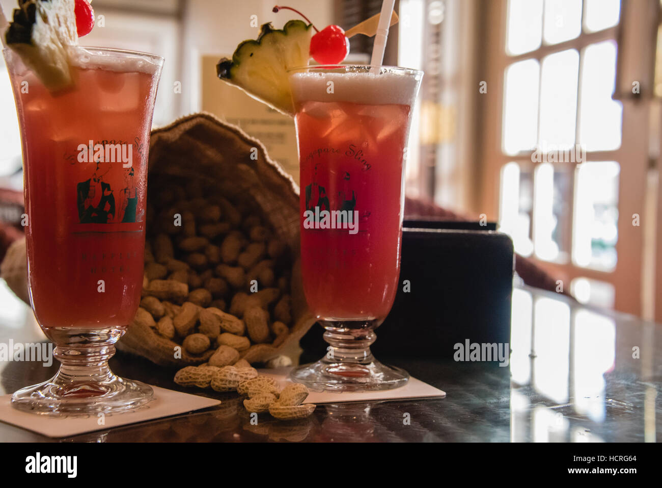 Two Singapore Sling cocktails at the famous Raffles Hotel Singapore ...
