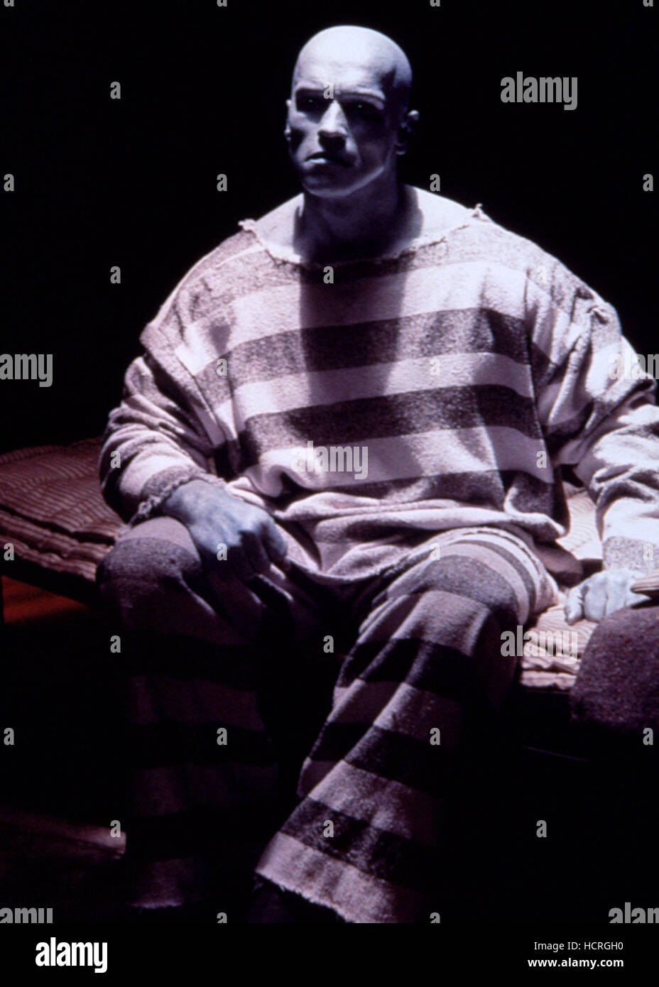 BATMAN AND ROBIN, Arnold Schwarzenegger, 1997, in prison stripes Stock ...