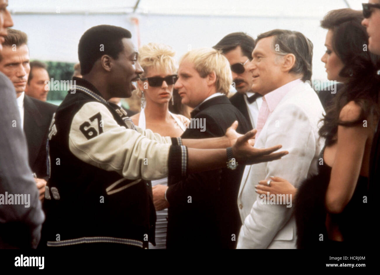 BEVERLY HILLS COP II, Jurgen Prochnow (crew cut, left), Eddie Murphy ...