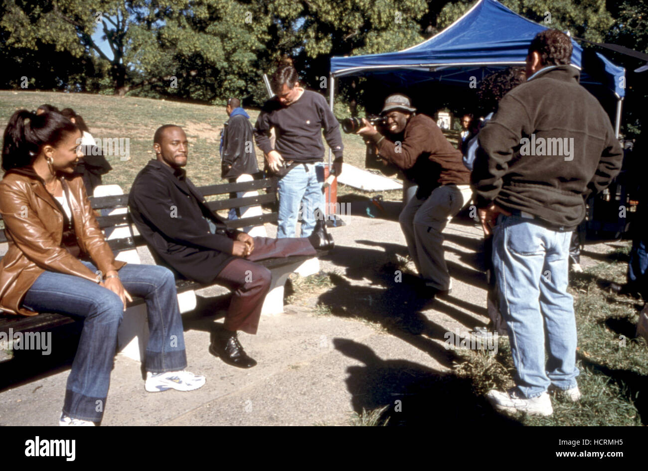 BROWN SUGAR, on bench: Sanaa Lathan, Taye Diggs, on set, 2002. TM ...