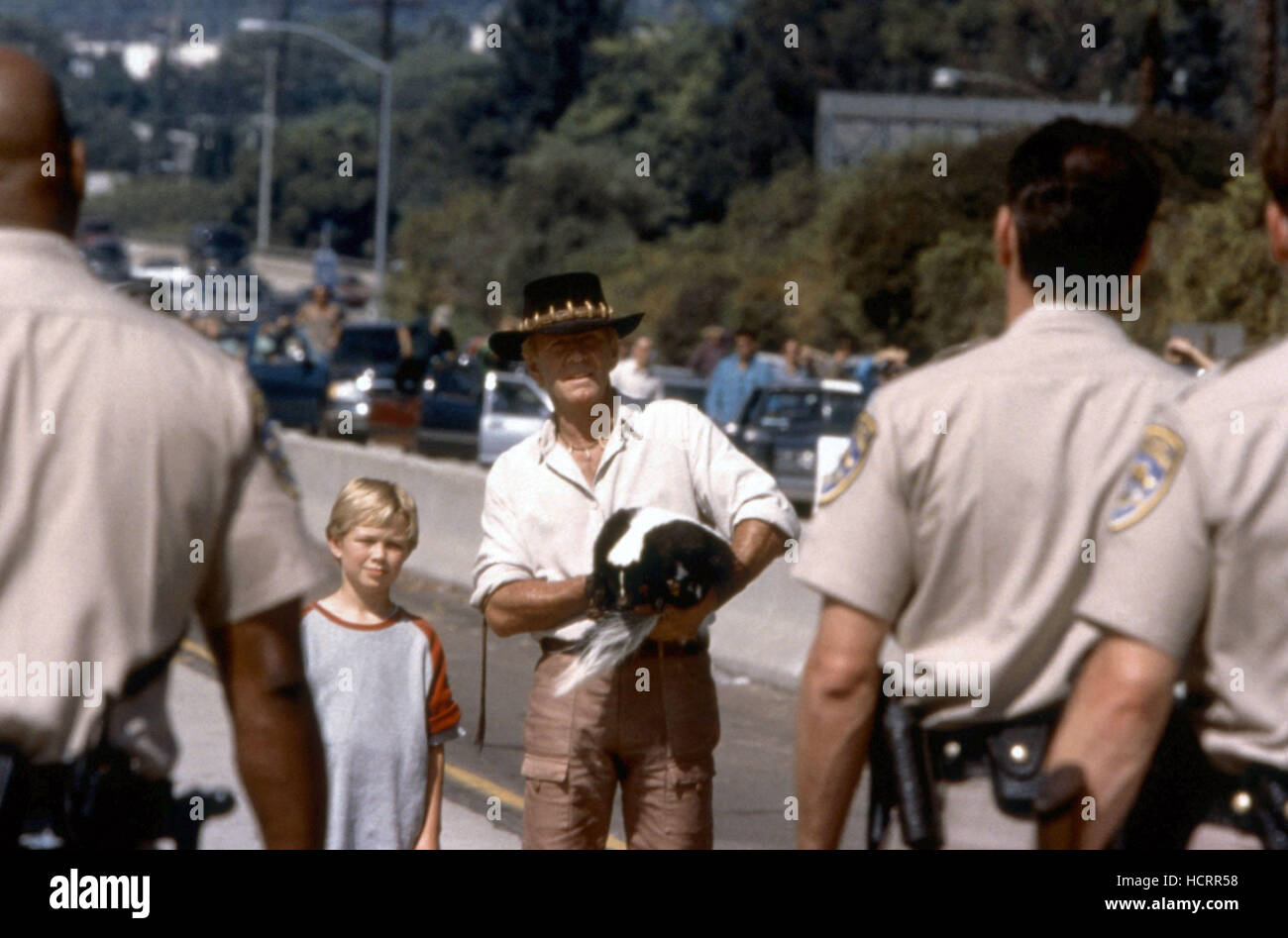 CROCODILE DUNDEE IN LOS ANGELES, Serge Cockburn (center, left), Paul ...