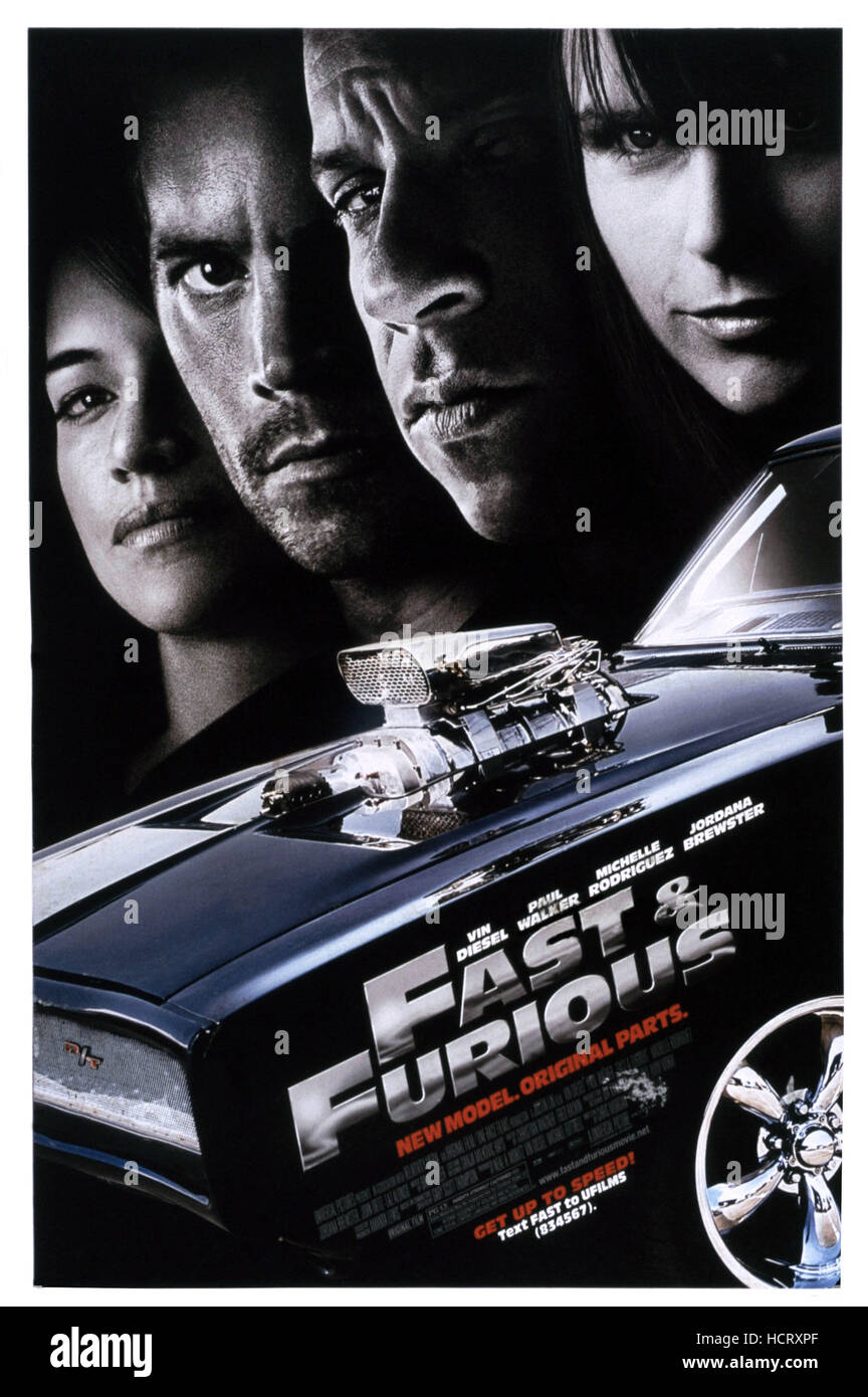 THE FAST AND THE FURIOUS, from left: Michelle Rodriguez, Paul Walker ...