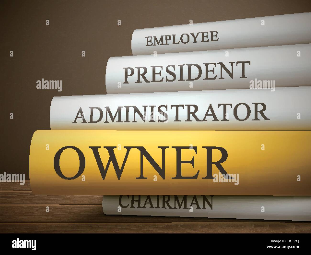 book title of owner isolated on a wooden table over dark background ...