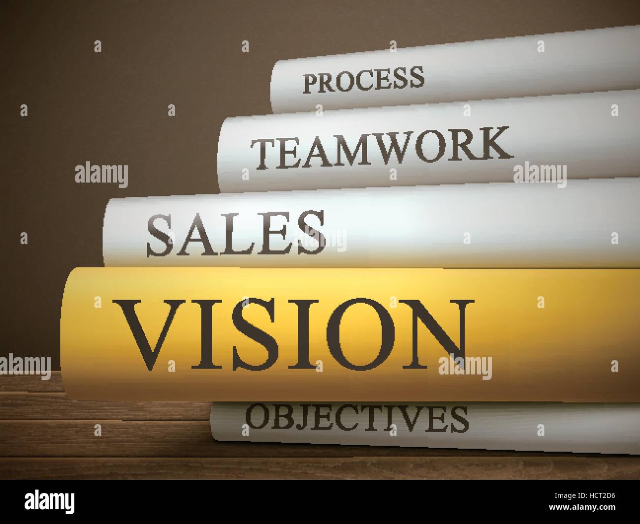 book title of vision isolated on a wooden table over dark background ...