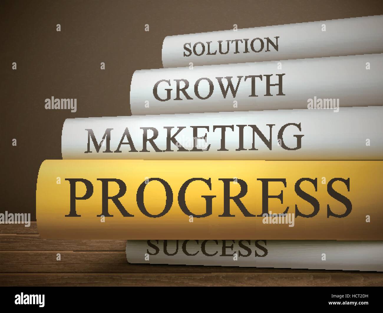 book title of progress isolated on a wooden table over dark background ...