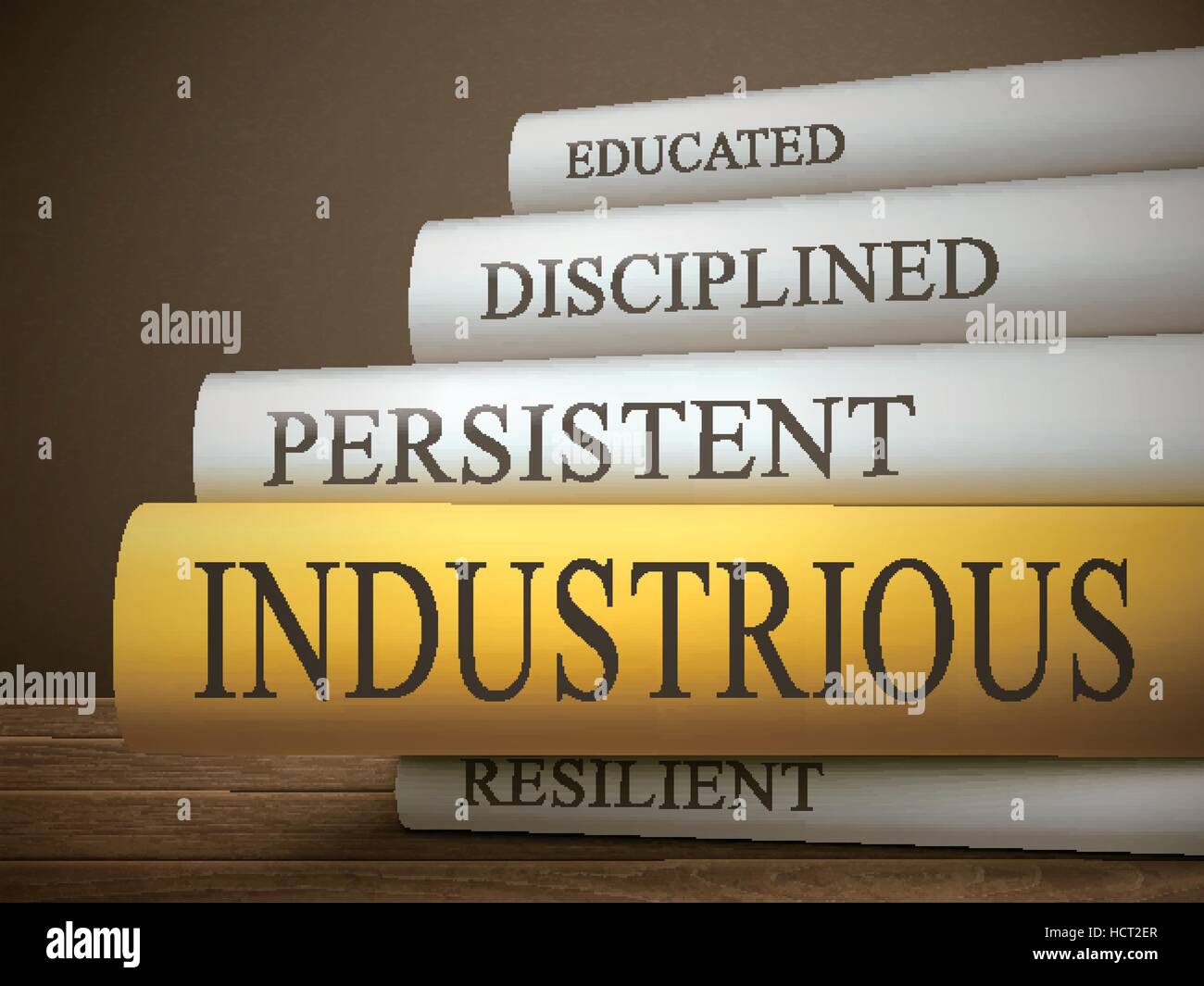 book title of industrious isolated on a wooden table over dark ...