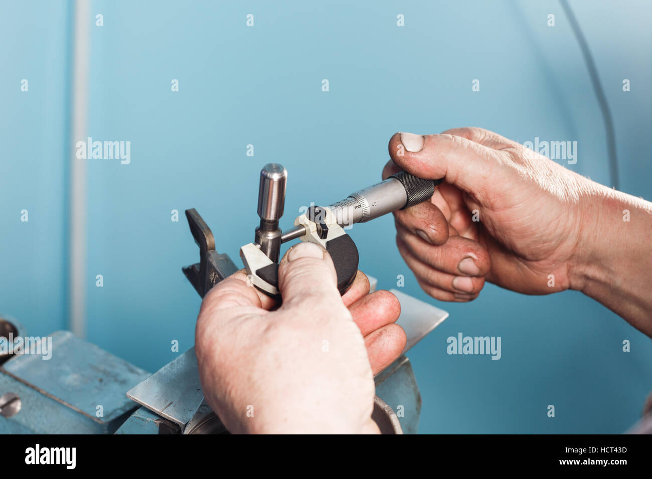 mechanical technician worker hands measuring detail tool after ...