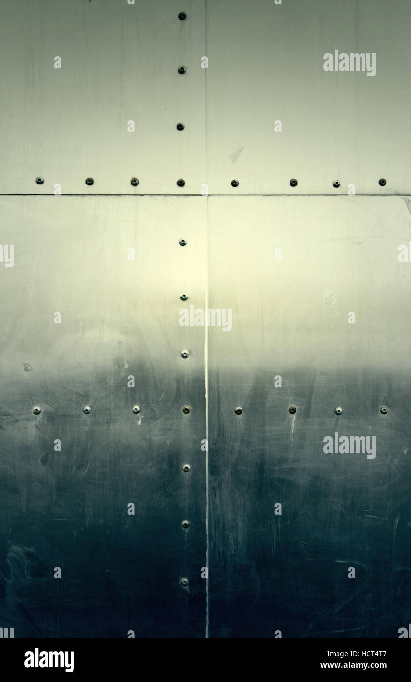 Metal background with rivets, detail of a steel background texture ...