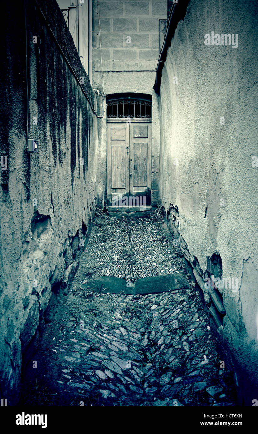 Dangerous alley in the city, detail of an old street in the city, urban ...