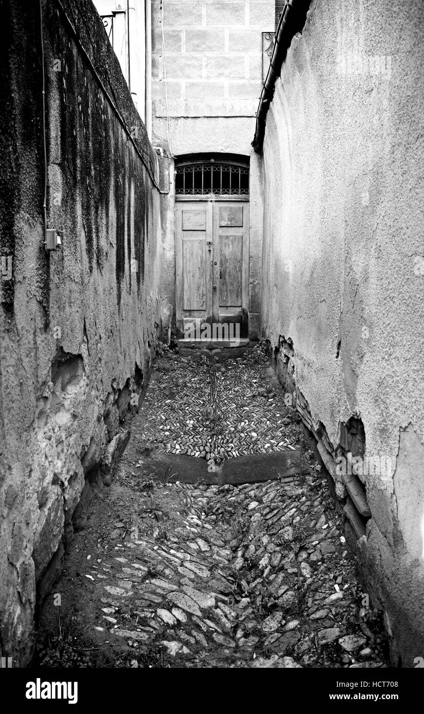Dangerous alley in the city, detail of an old street in the city, urban ...