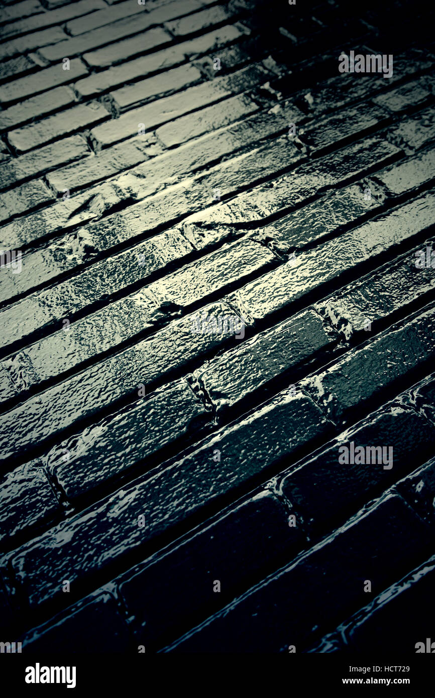 Shiny black floor, black ground detail in the bright city background ...