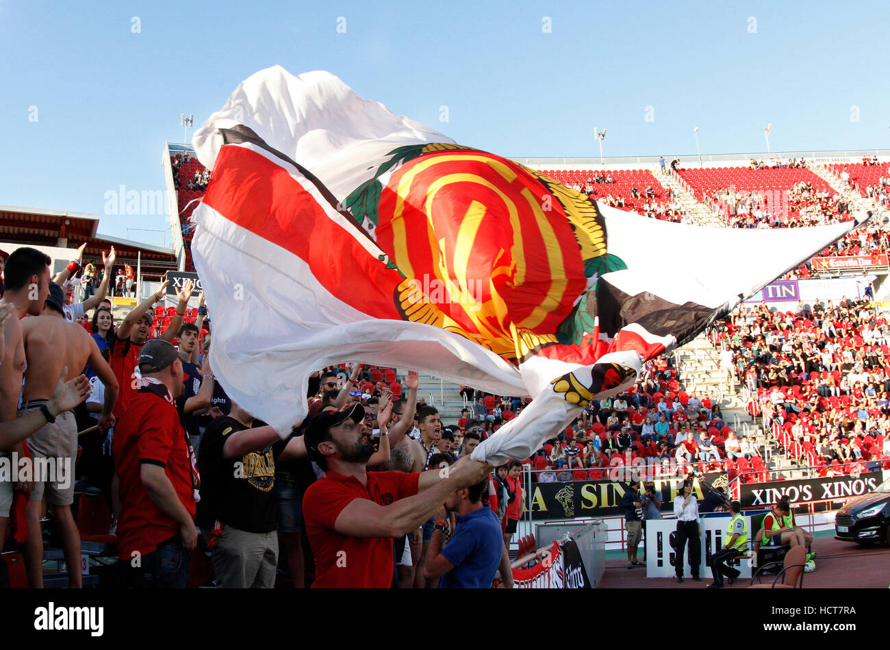 Crowd of spectators in the stands of the football field Stock Photo - Alamy