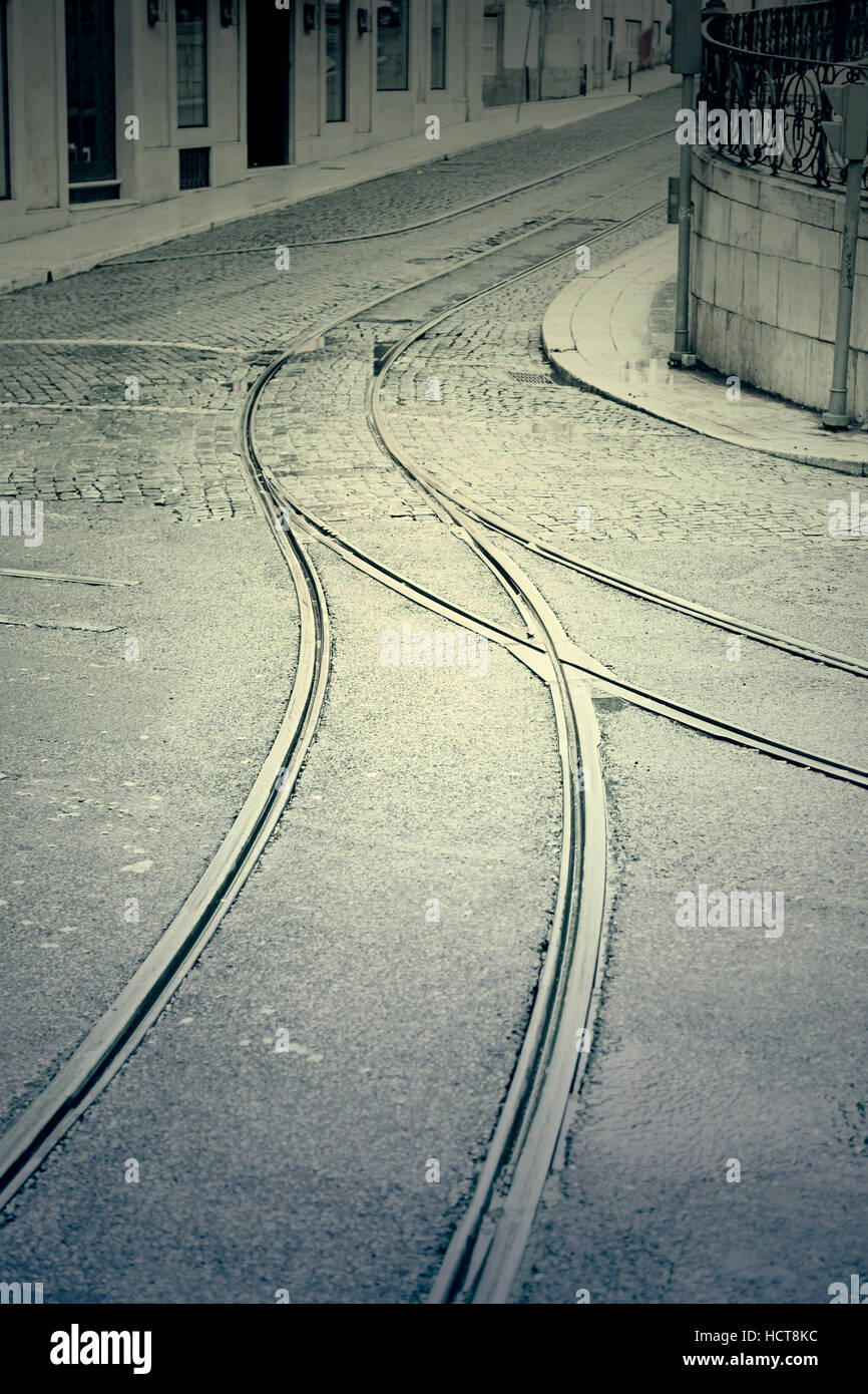Tram tracks on a street in Lisbon, detail of a route for public ...