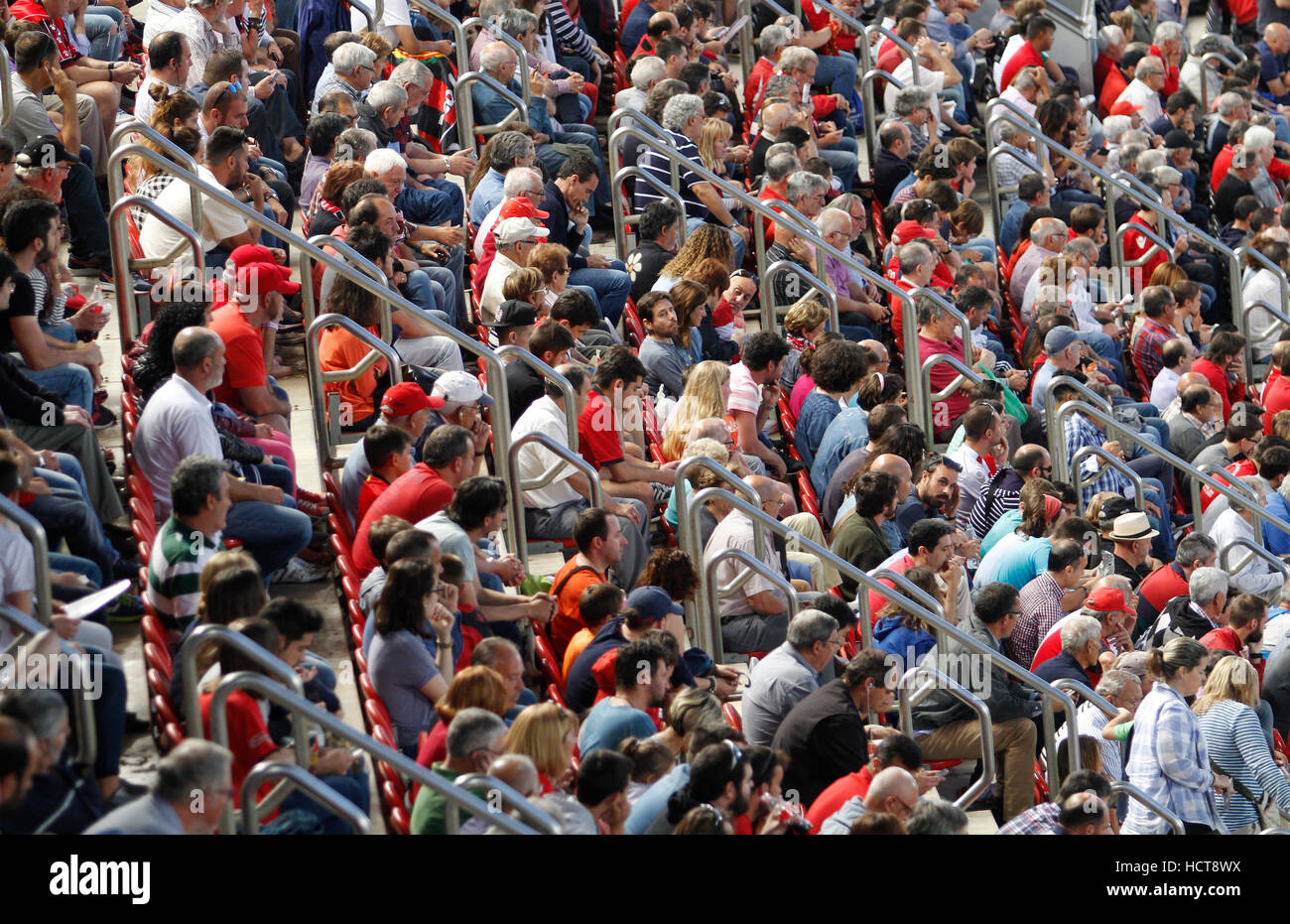 Crowd of spectators in the stands of the football field Stock Photo - Alamy