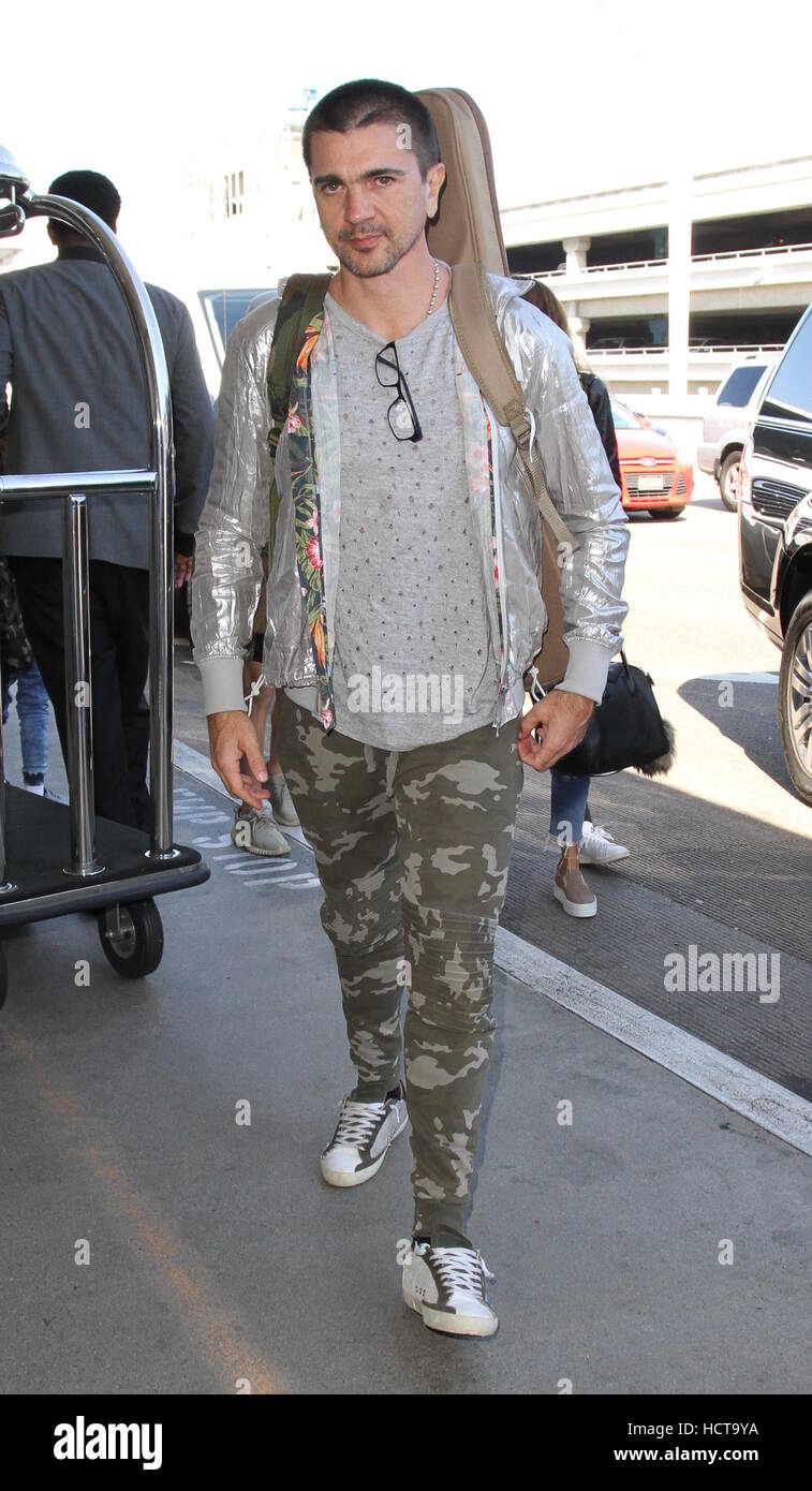 Juanes and family at Los Angeles International Airport (LAX) Featuring ...