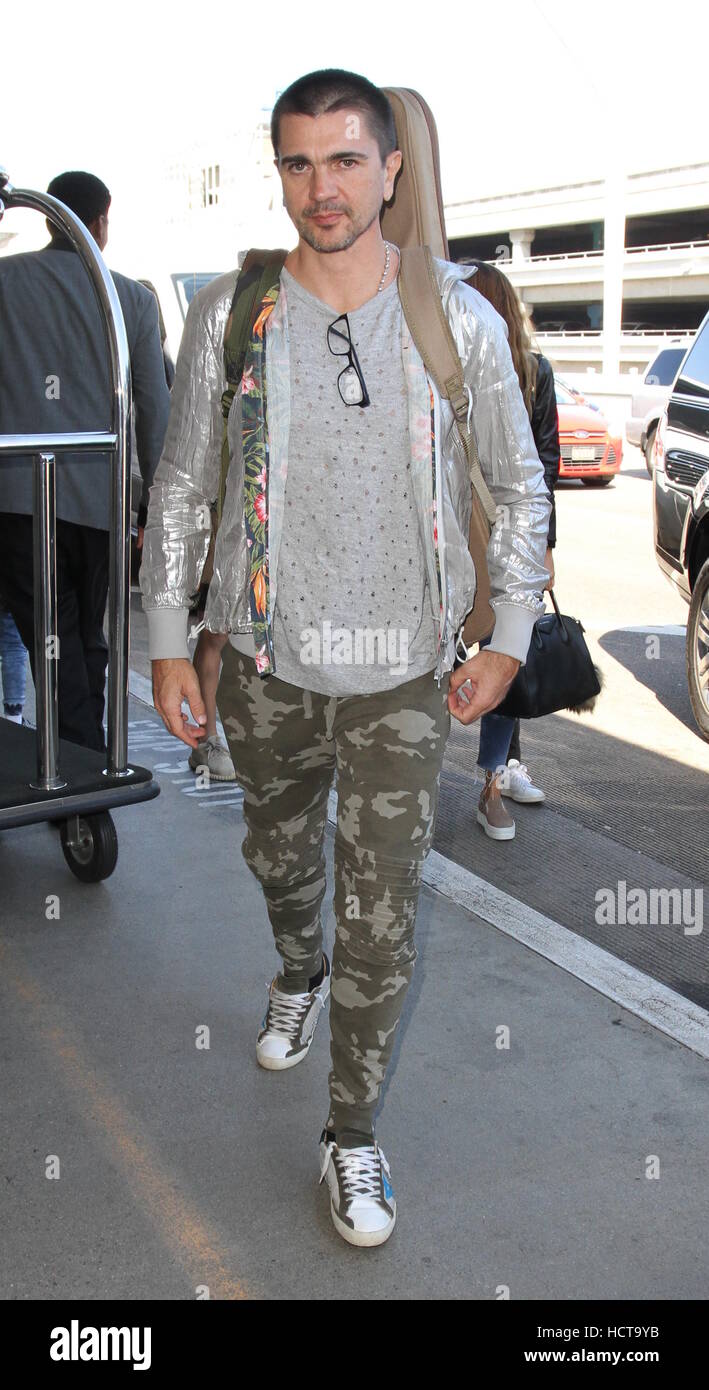 Juanes and family at Los Angeles International Airport (LAX) Featuring ...